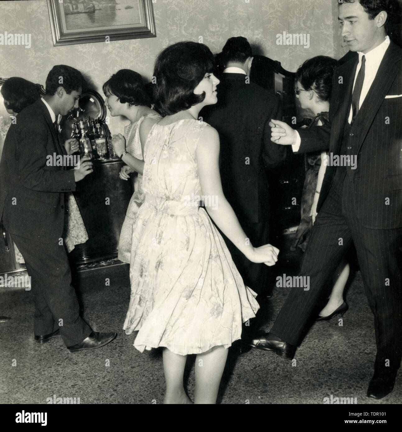 People Dancing At A House Party