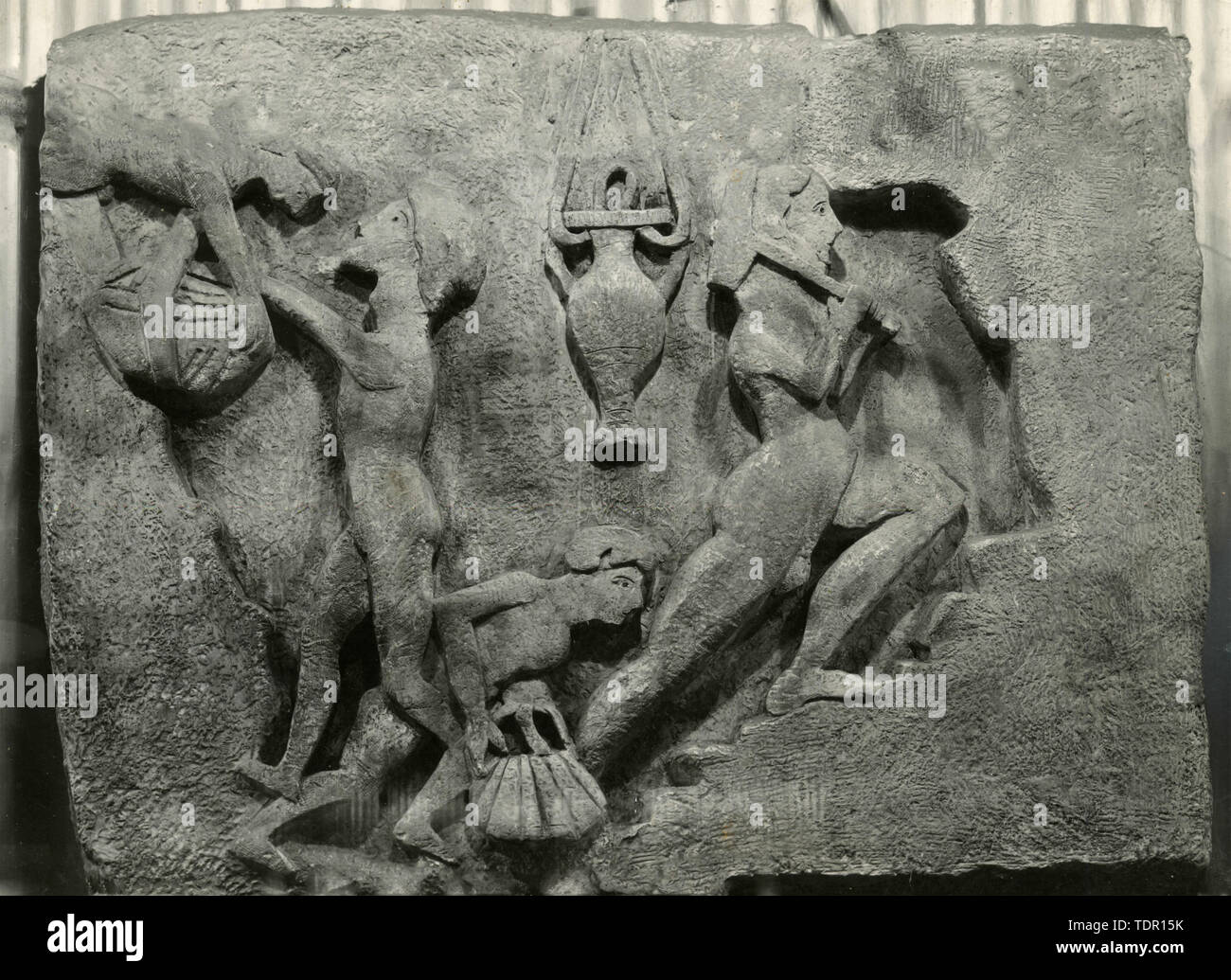 Ancient miners, marble bas-relief, 1930s Stock Photo - Alamy