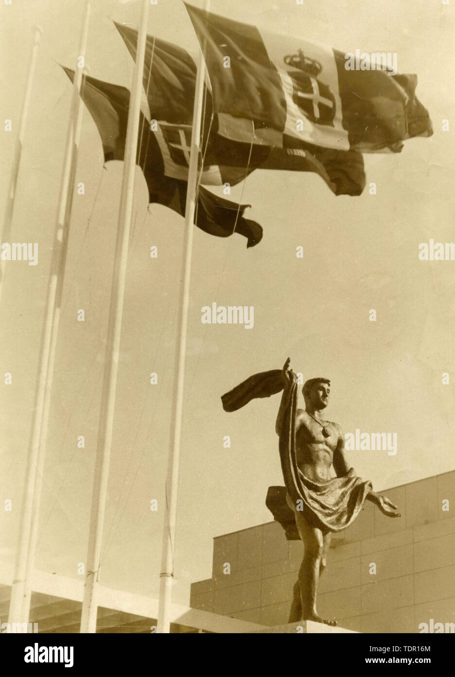 Italian Savoy flags waving close to a statue, Italy 1930s Stock Photo ...