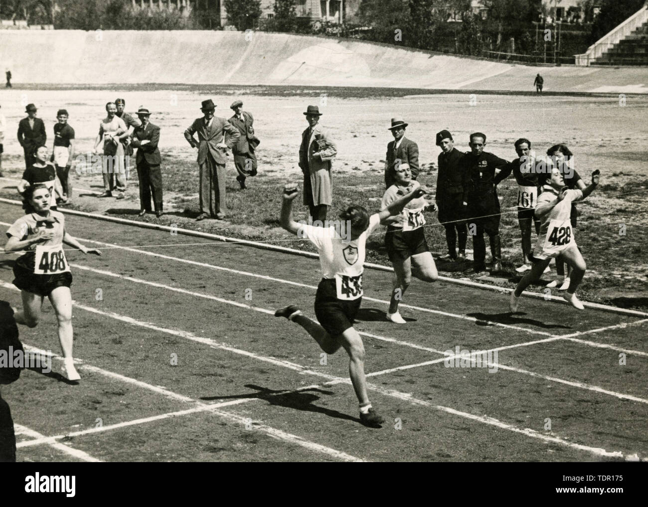 1930s women running hi-res stock photography and images - Alamy