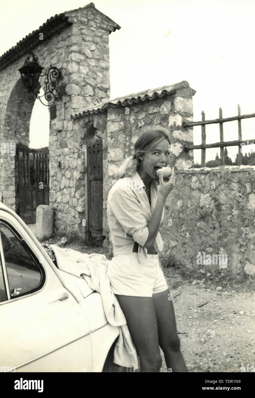 German actress Solvi Stubing eating an apple, 1960s Stock Photo - Alamy