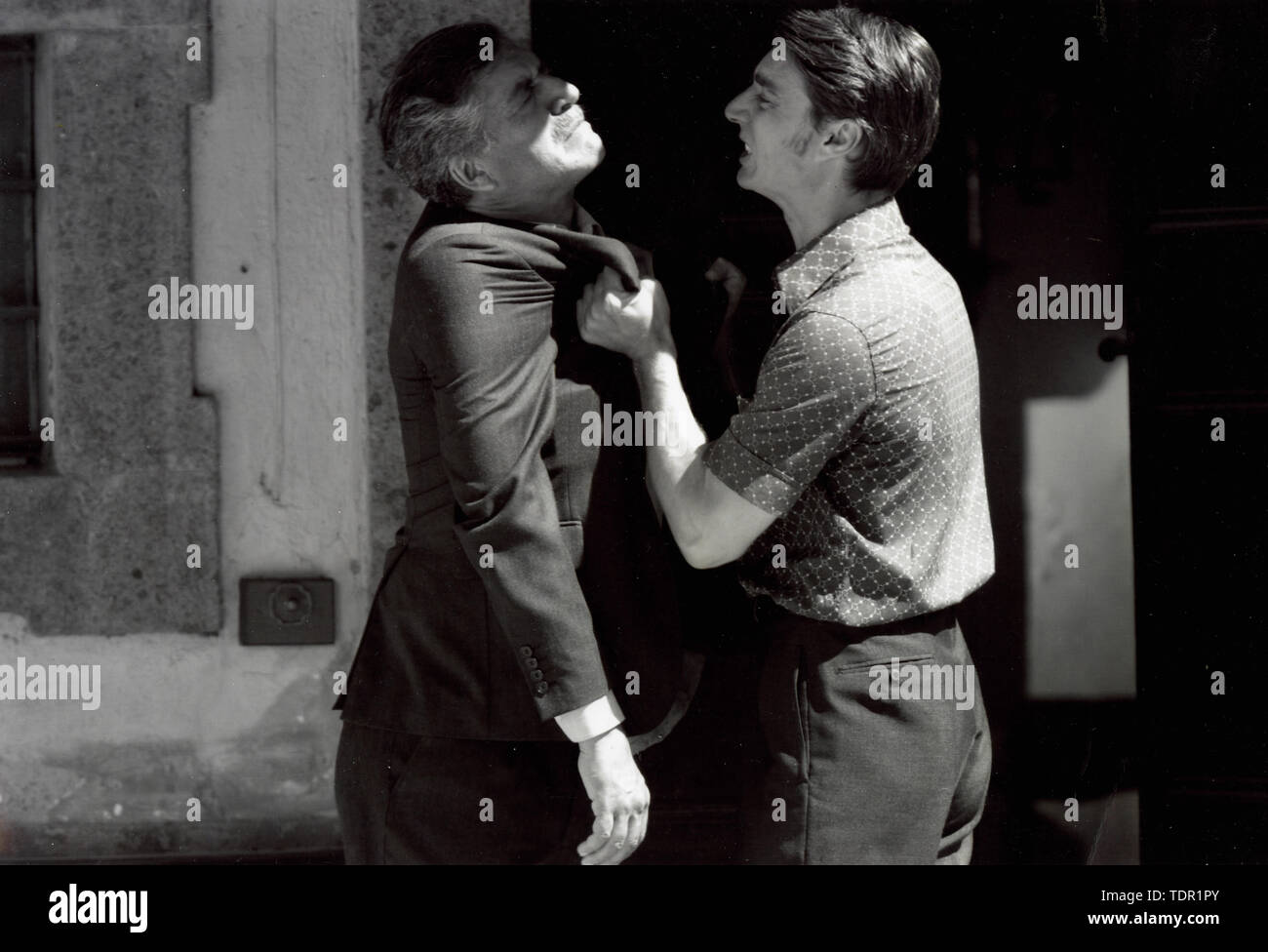 Man bullying another man, unidentified movie 1980s Stock Photo - Alamy