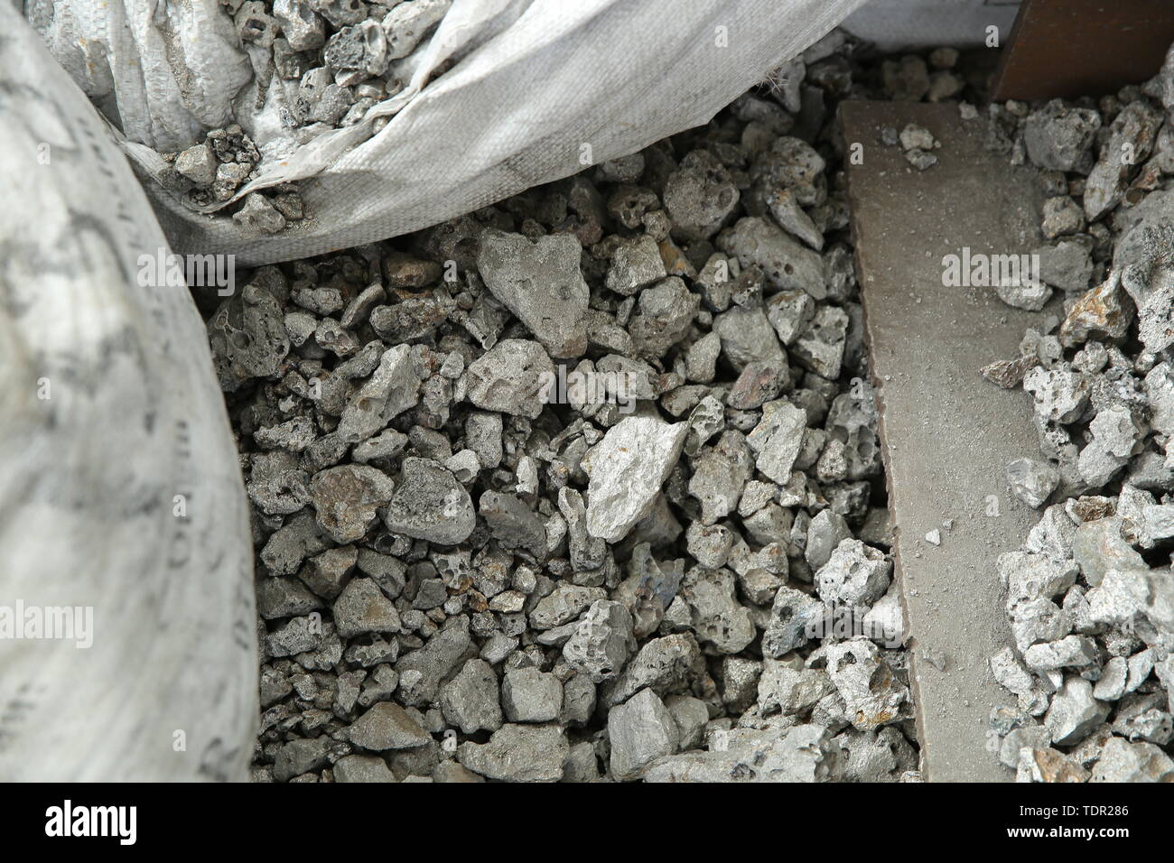 Iron ore ingots Stock Photo - Alamy