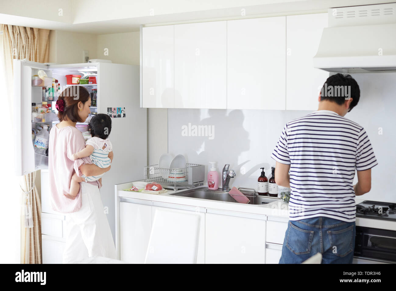 Japanese family at home Stock Photo - Alamy
