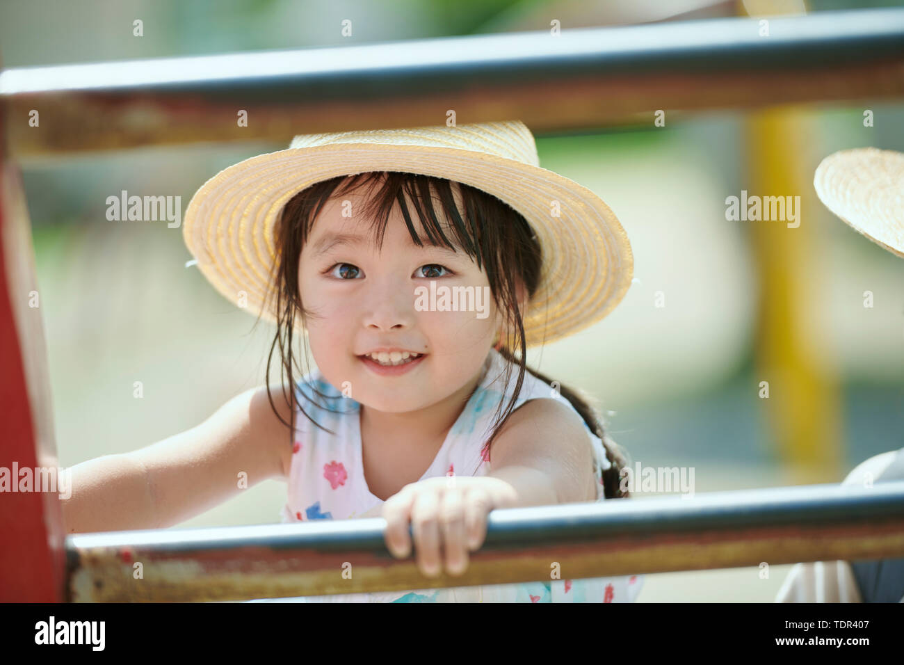 Japanese kid in a city park Stock Photo - Alamy