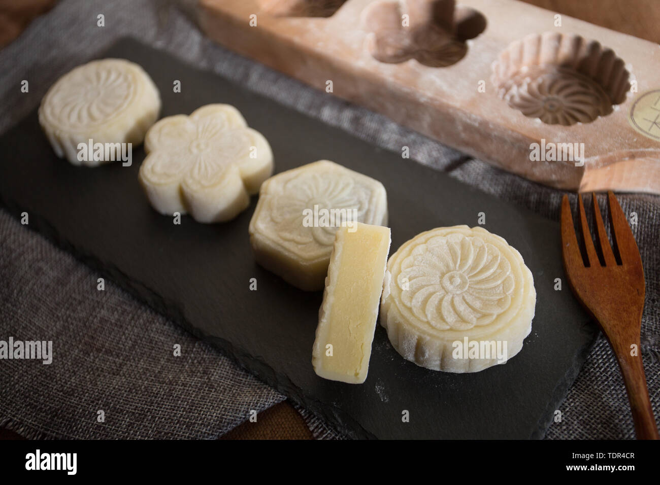 Homemade ice moon cakes cut open Stock Photo - Alamy