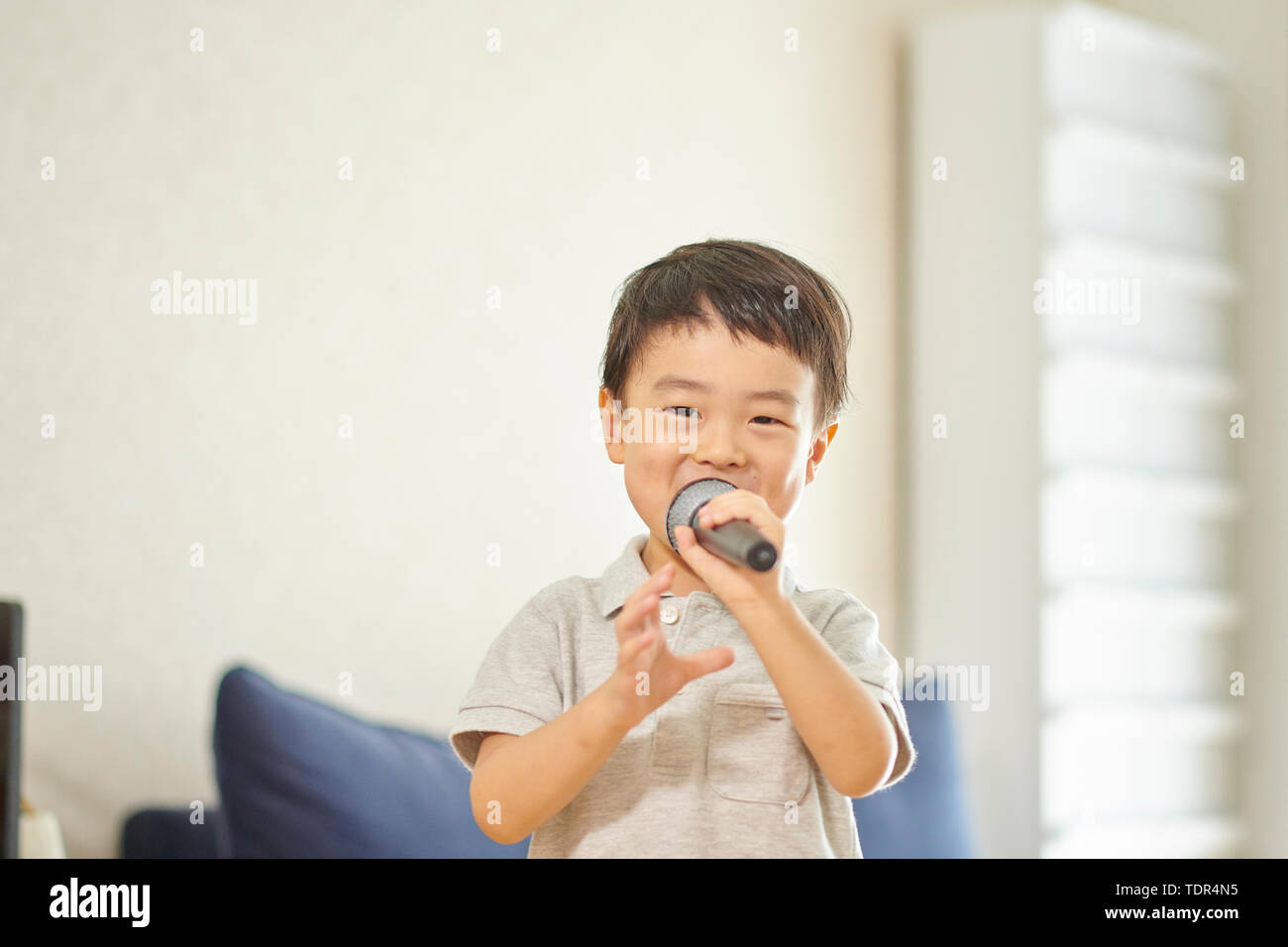 Singing at home with children hi-res stock photography and images - Alamy