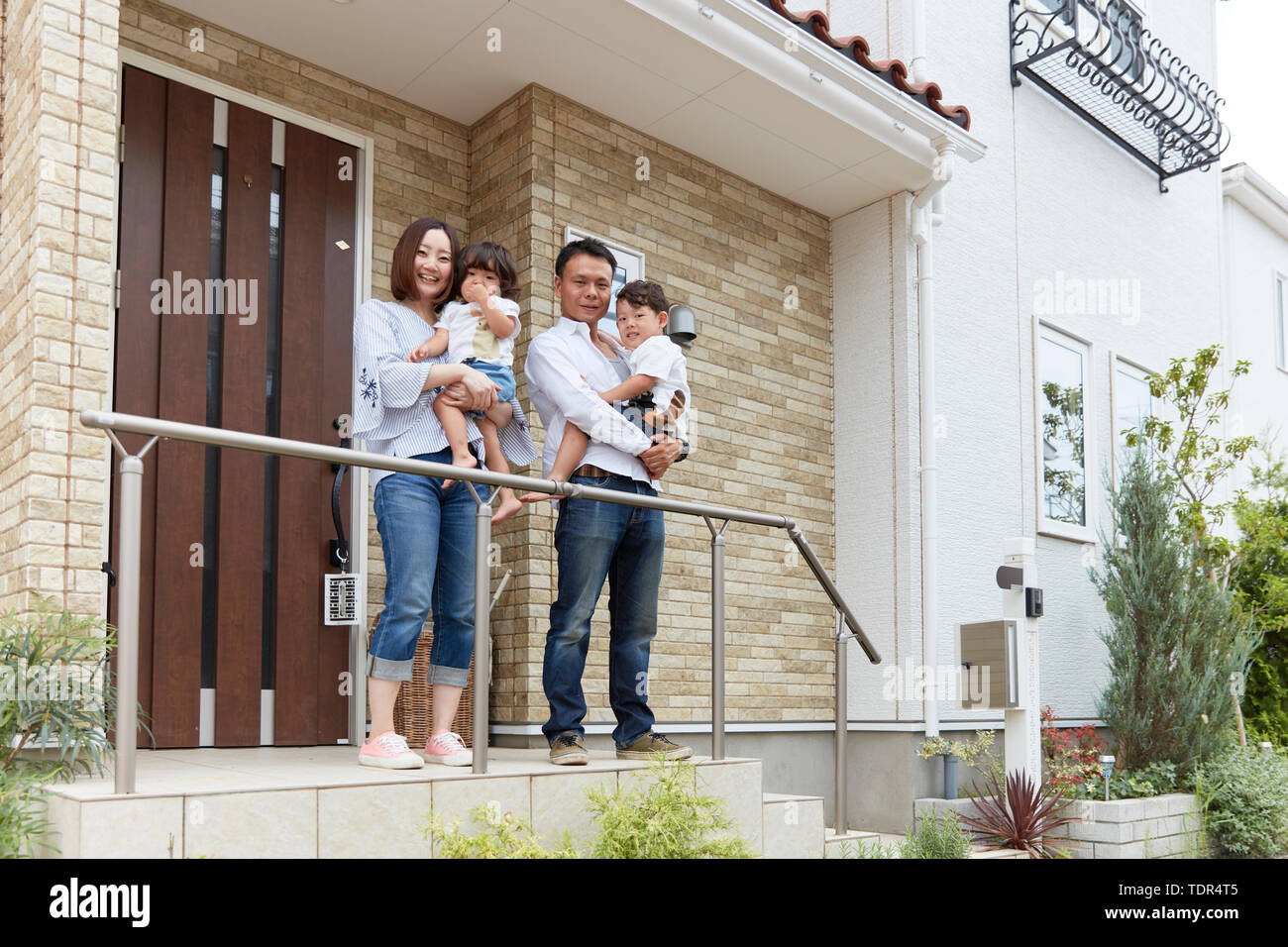 Japanese family outdoors Stock Photo - Alamy