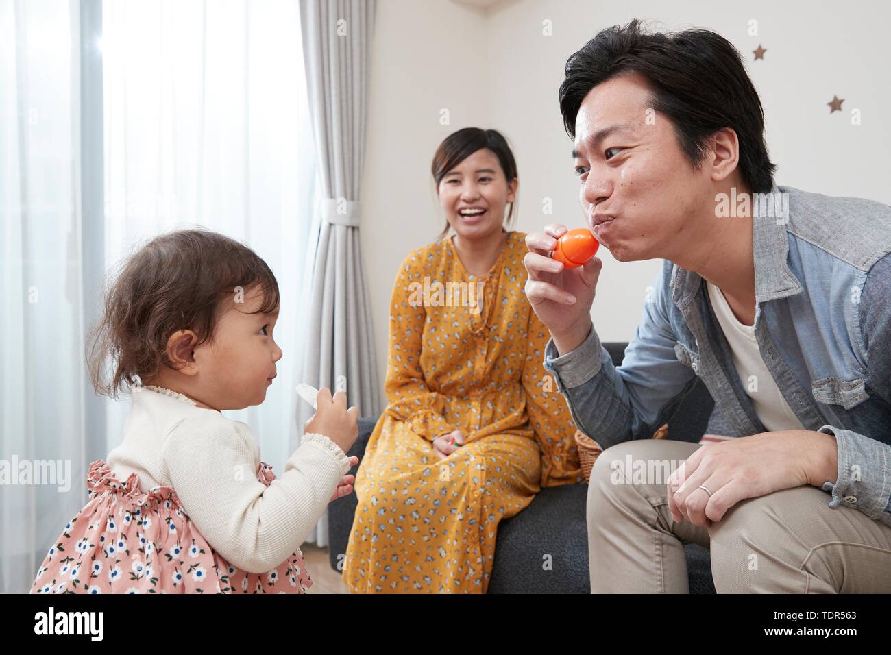 Asian family living hi-res stock photography and images - Alamy