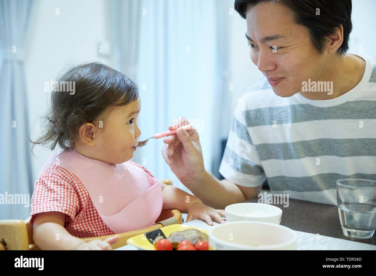 Japanese kid with father at home Stock Photo - Alamy