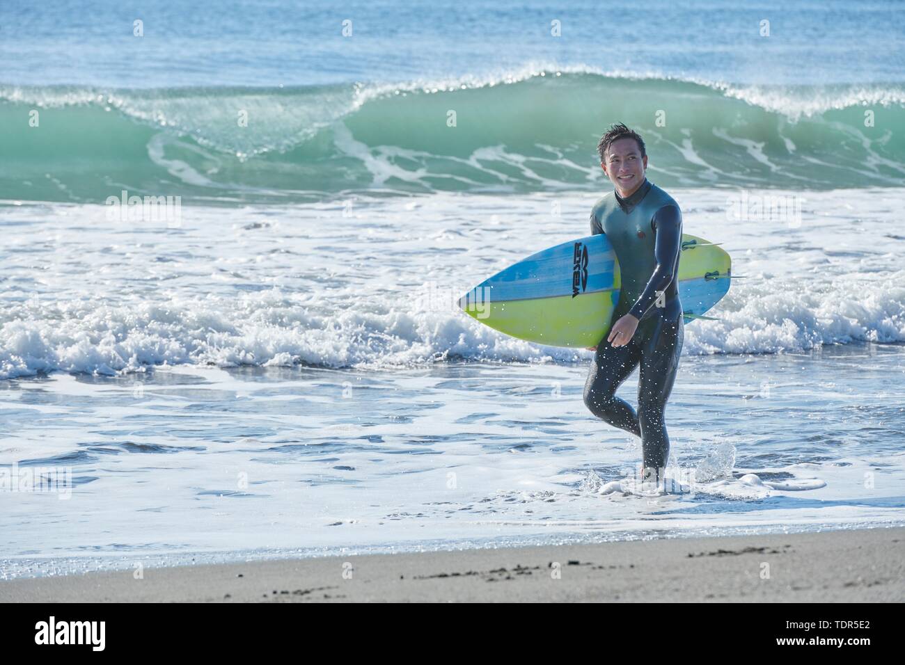 Japanese surfer at the beach Stock Photo - Alamy