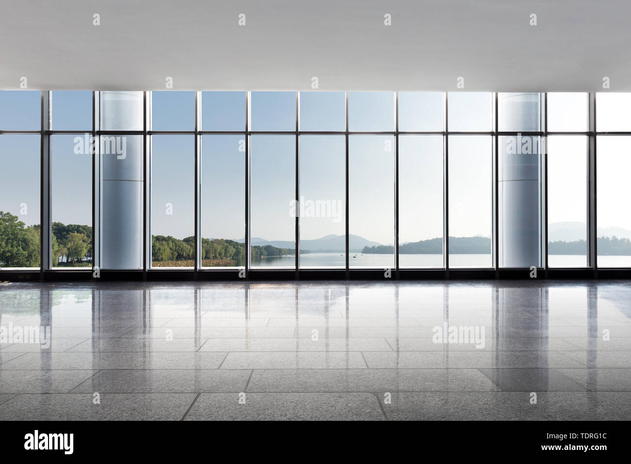 Empty office with beautiful lake Stock Photo - Alamy