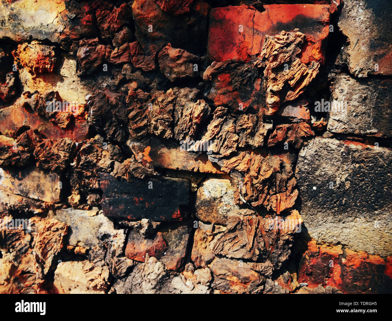 Burned red brick walls Stock Photo - Alamy