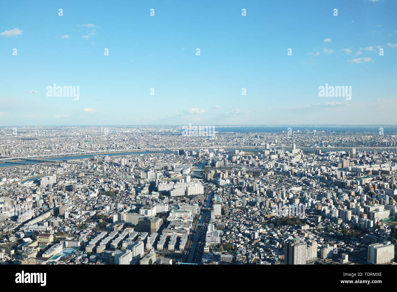 A bird's-eye view of the sunny sky tower in Tokyo, Japan Stock Photo ...