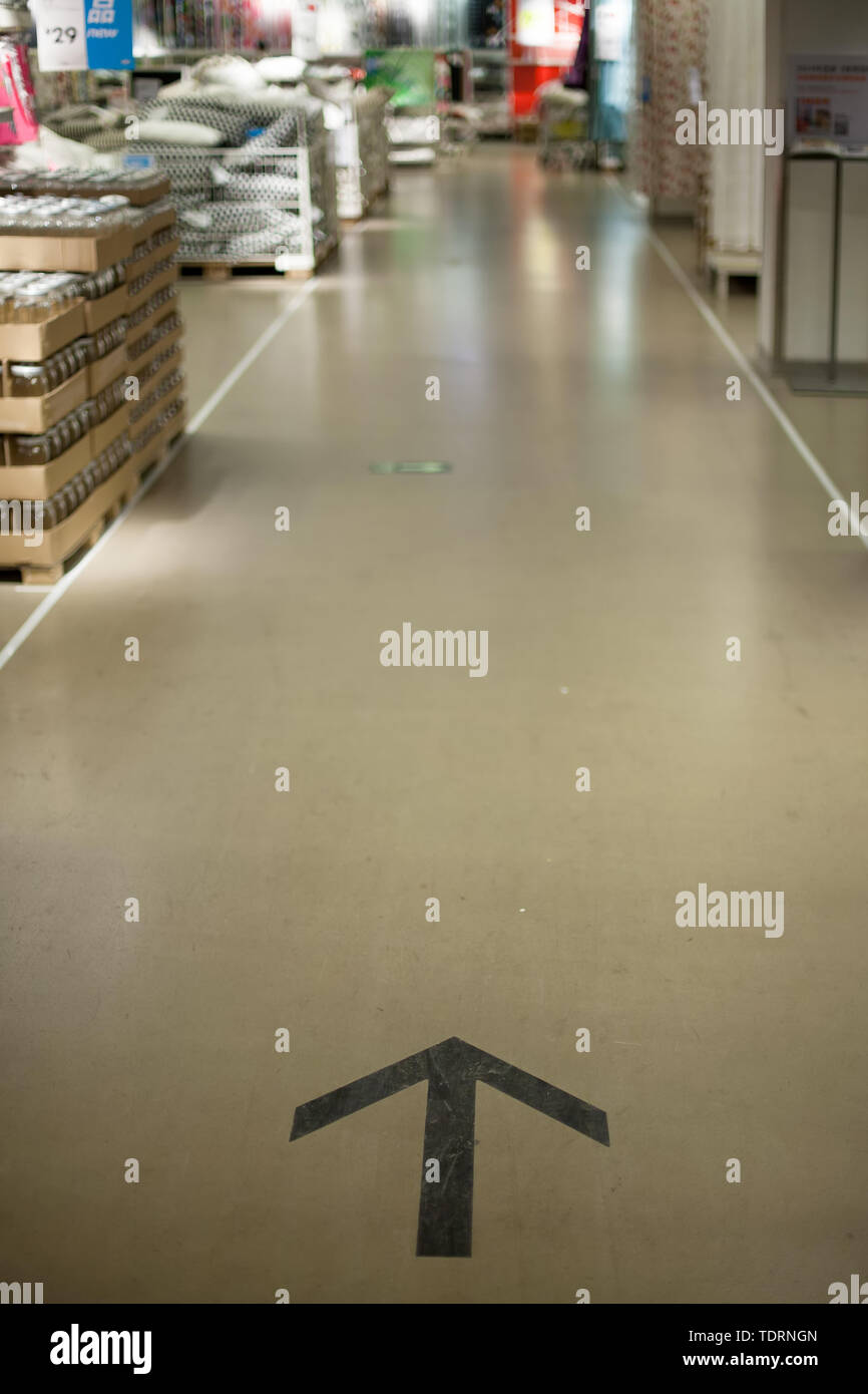 The arrows on the ground in the store guide the flow of people Stock ...