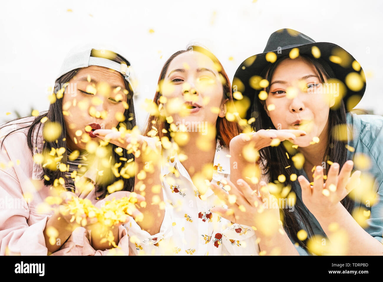 Girl throwing confetti hi-res stock photography and images - Alamy