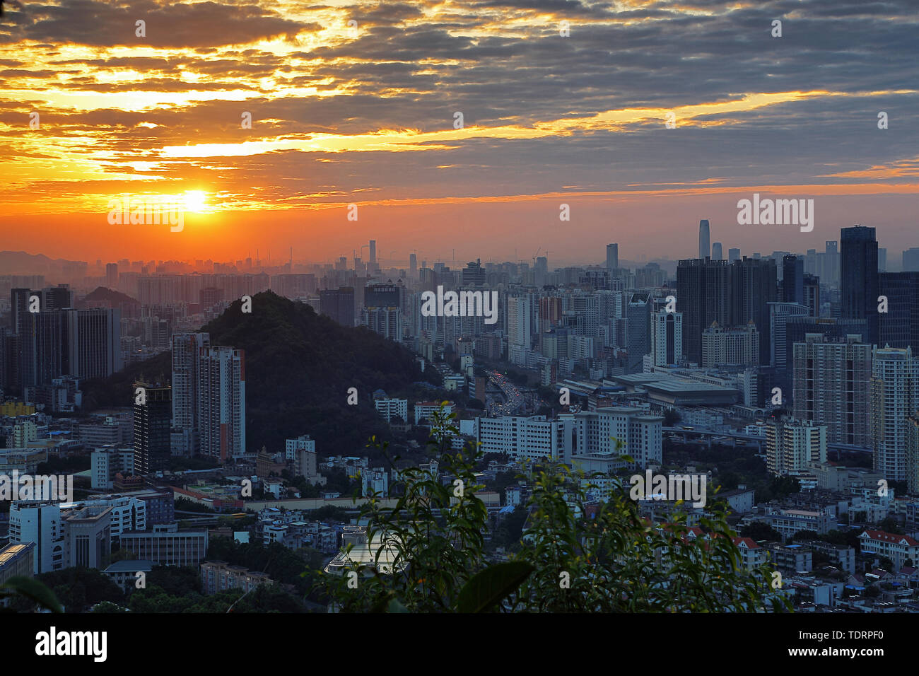 Guangzhou Baiyun Mountain overlooks the sky and sunrise city scenery ...