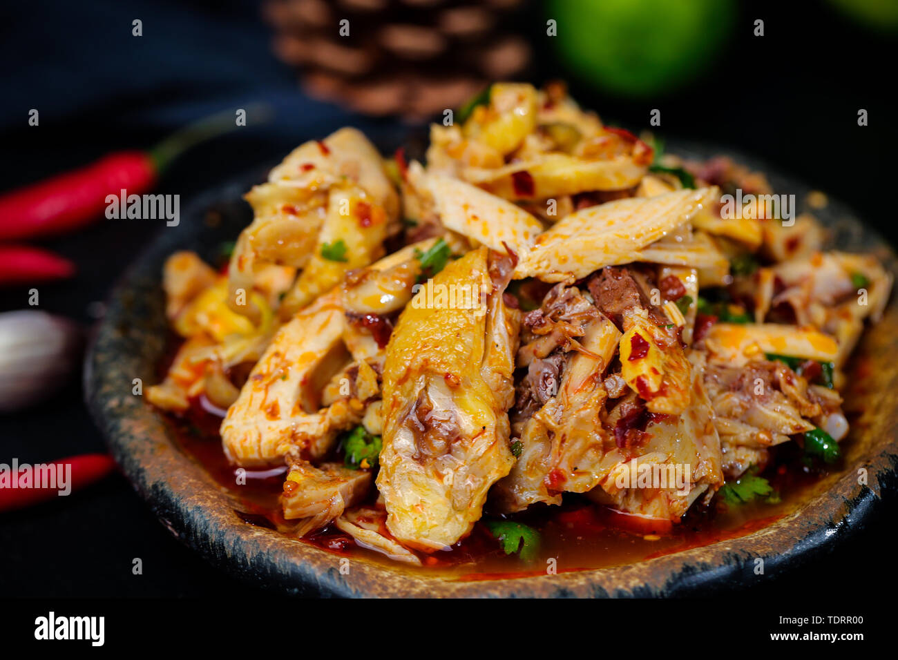 drooling chicken, stick chicken Stock Photo - Alamy