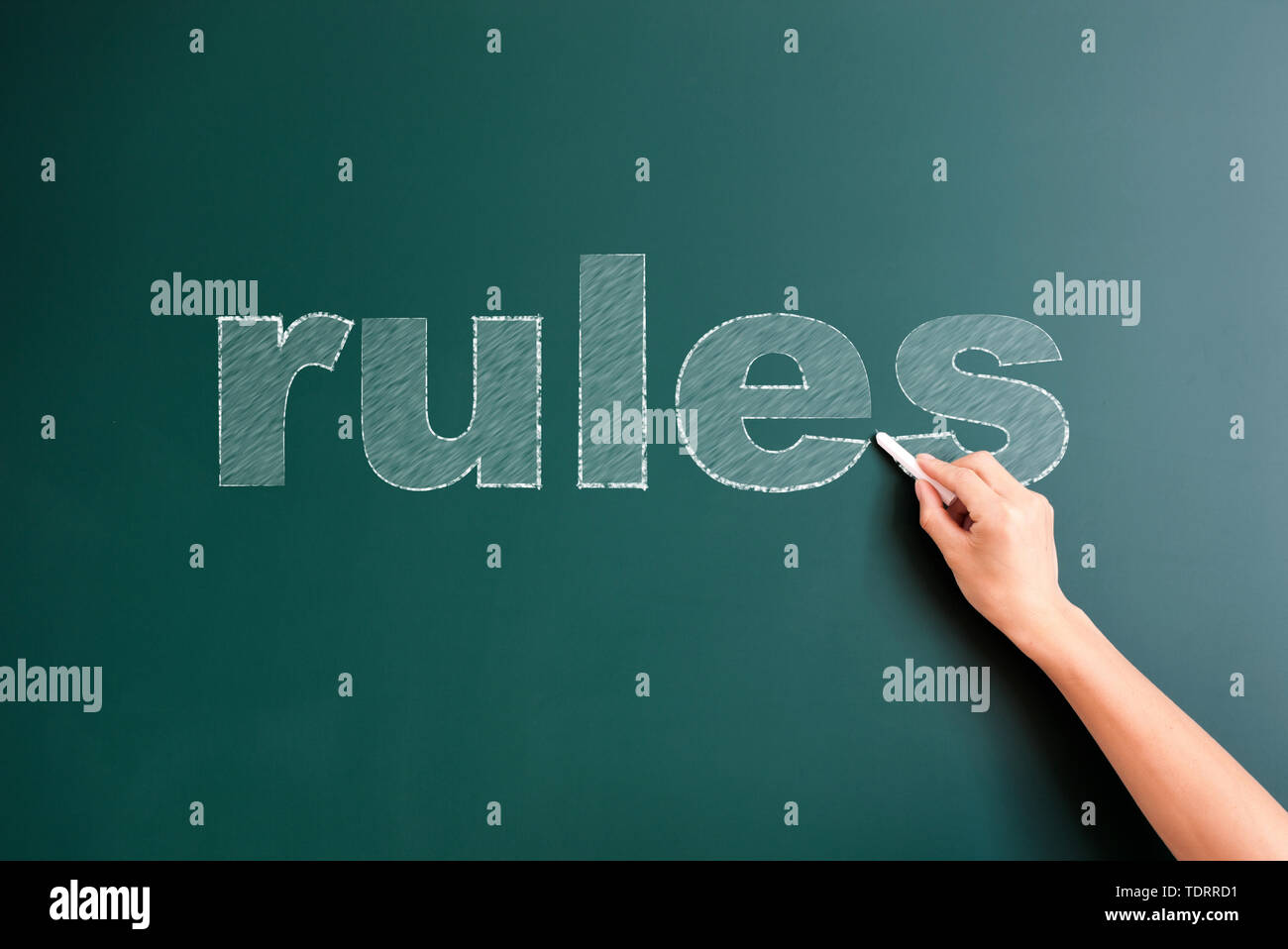 Rules written on blackboard Stock Photo - Alamy
