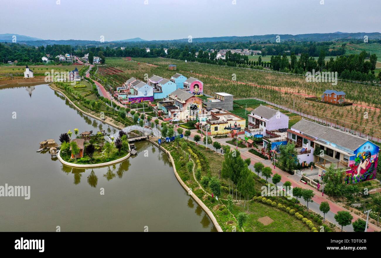 Luonan. 17th June, 2019. Aerial photo taken on June 17, 2019 shows a ...