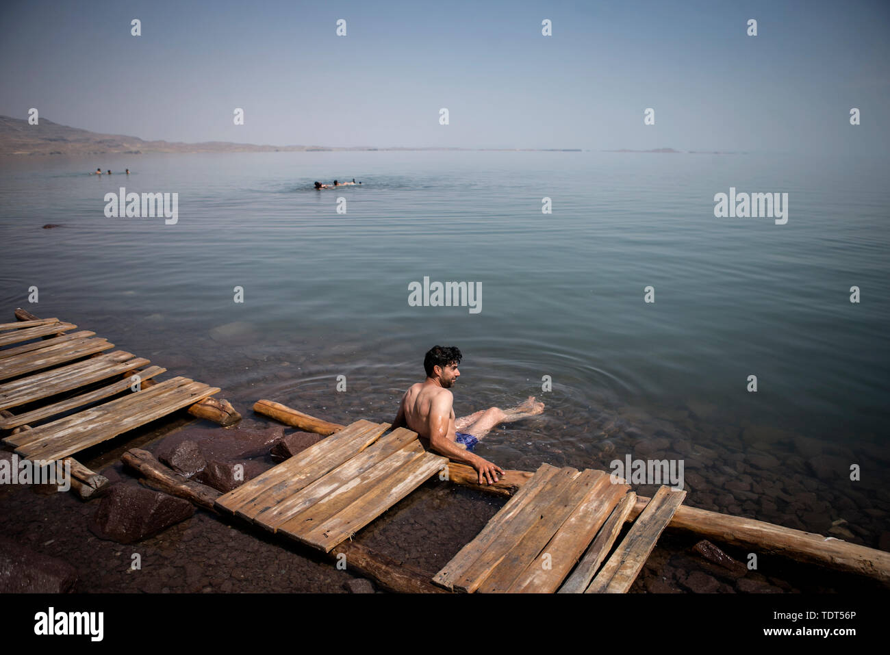 Urmia. 17th June, 2019. A man is seen in the Urmia Lake in northwestern ...