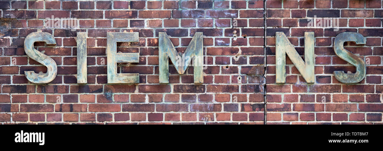 19 June 2019, Berlin: An old, incomplete Siemens lettering is hanging ...