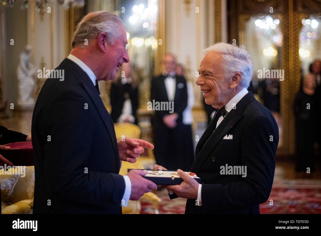 The Prince of Wales presents designer Ralph Lauren with his honorary ...
