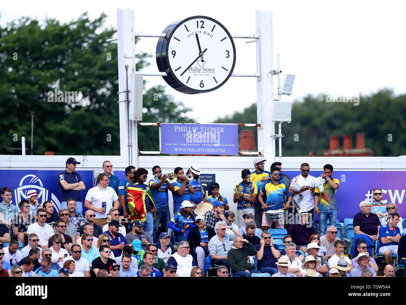 Sri Lanka fans play musical instruments underneath the Dickie Bird ...