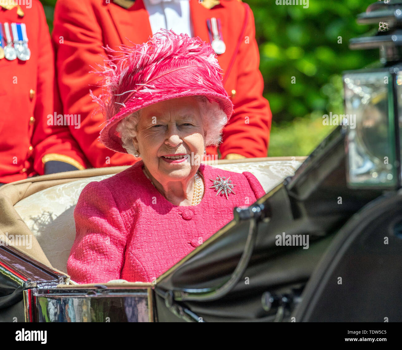 Queen Elizabeth II in her carriage as she heads to Ascot Race course ...