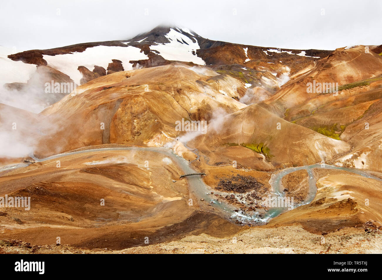 Hveradalir geothermal area with Rhyolite mountains and snow fields ...