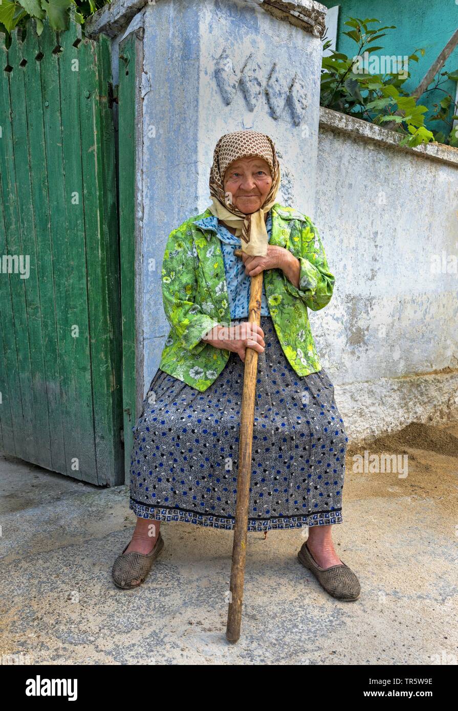 Elderly woman garden gate hi-res stock photography and images - Alamy