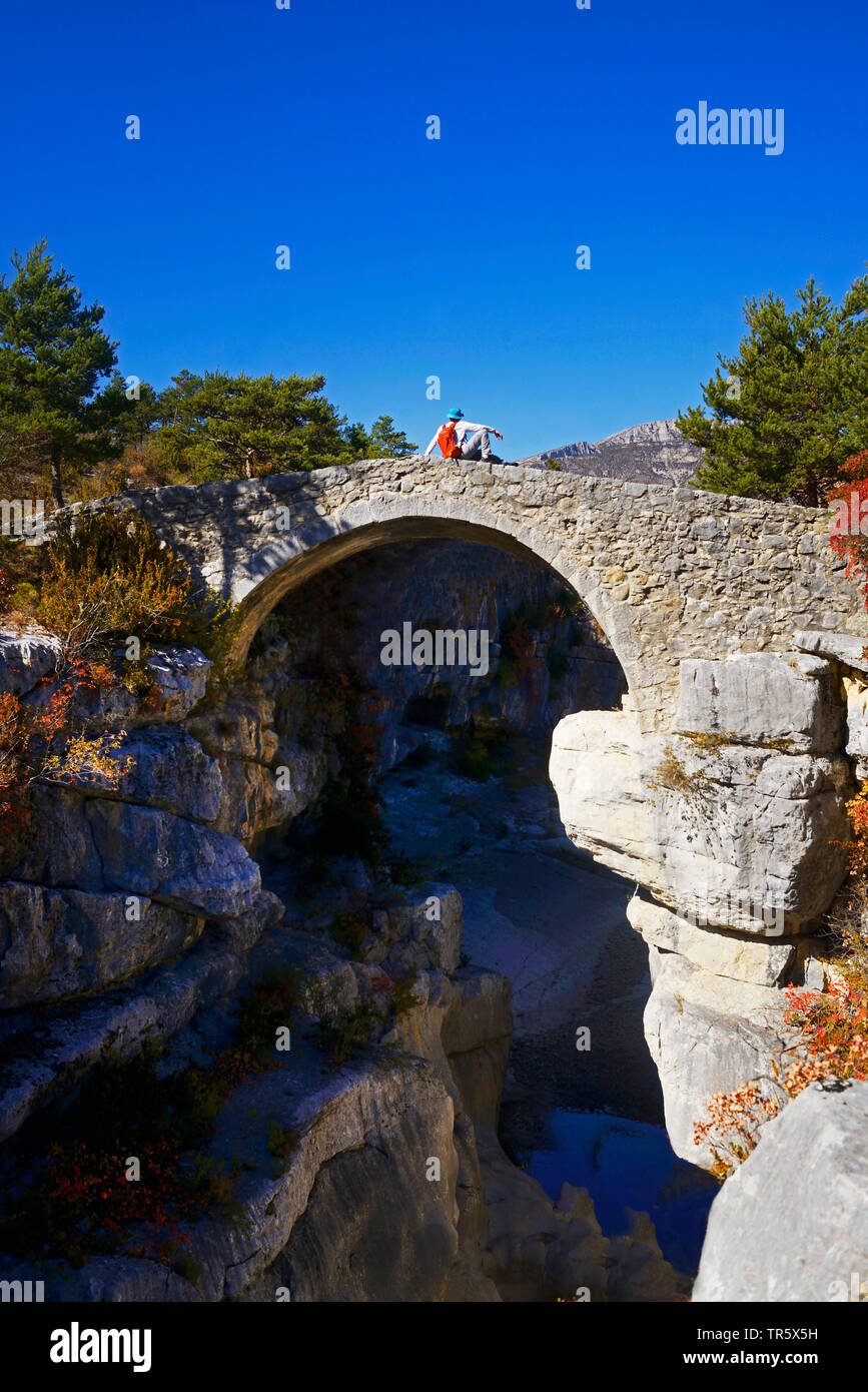 Person walks down bridge in hi-res stock photography and images - Alamy