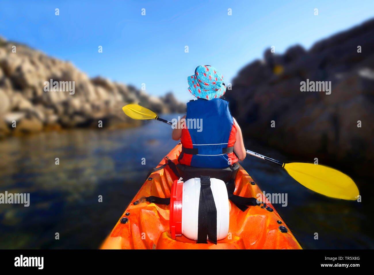 Sea kayaking near rocky coast of Corsica island, France, Corsica ...