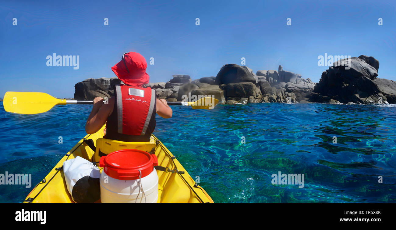 Sea kayaking near rocky coast of Corsica island, France, Corsica ...