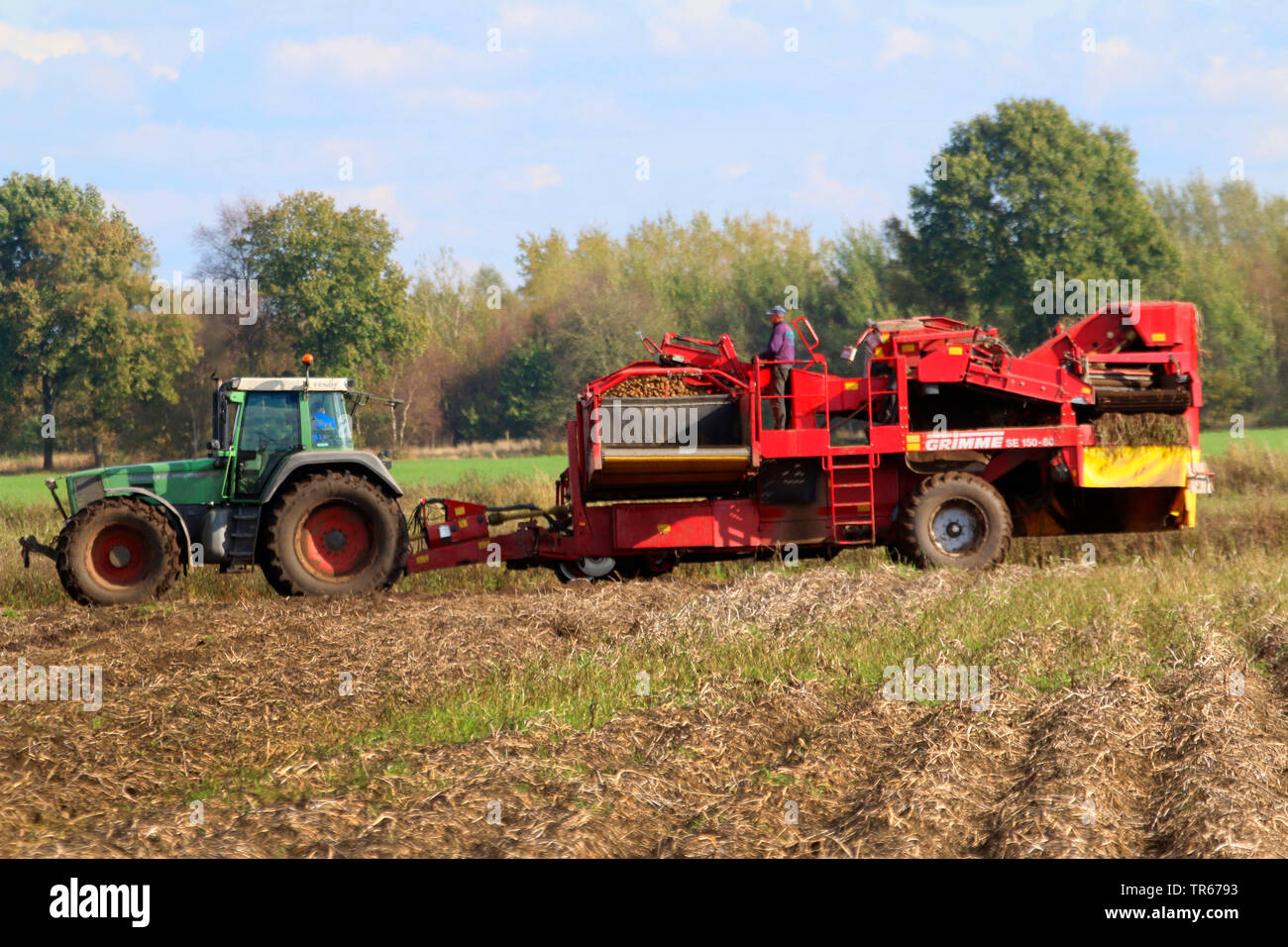 Harvester works in field view hi-res stock photography and images - Alamy