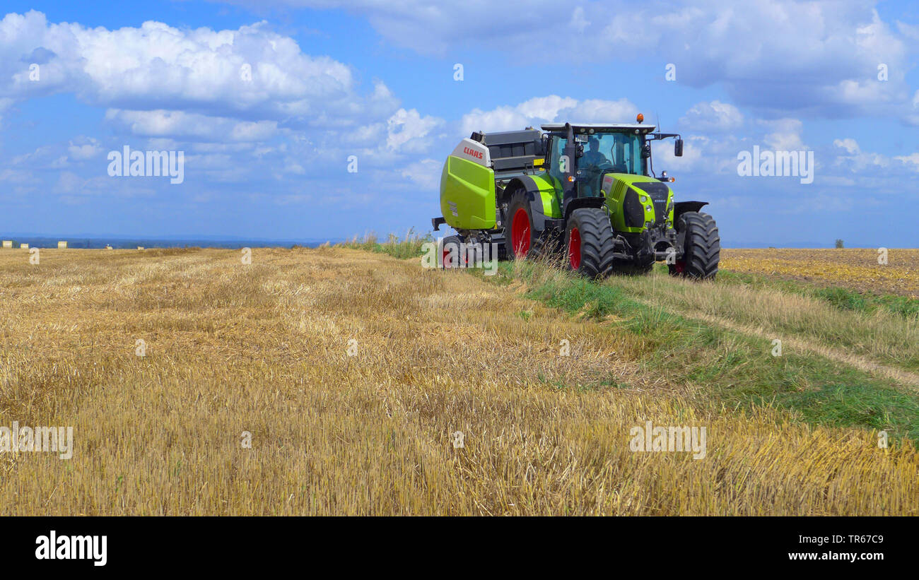 Round baler tractor hi-res stock photography and images - Alamy