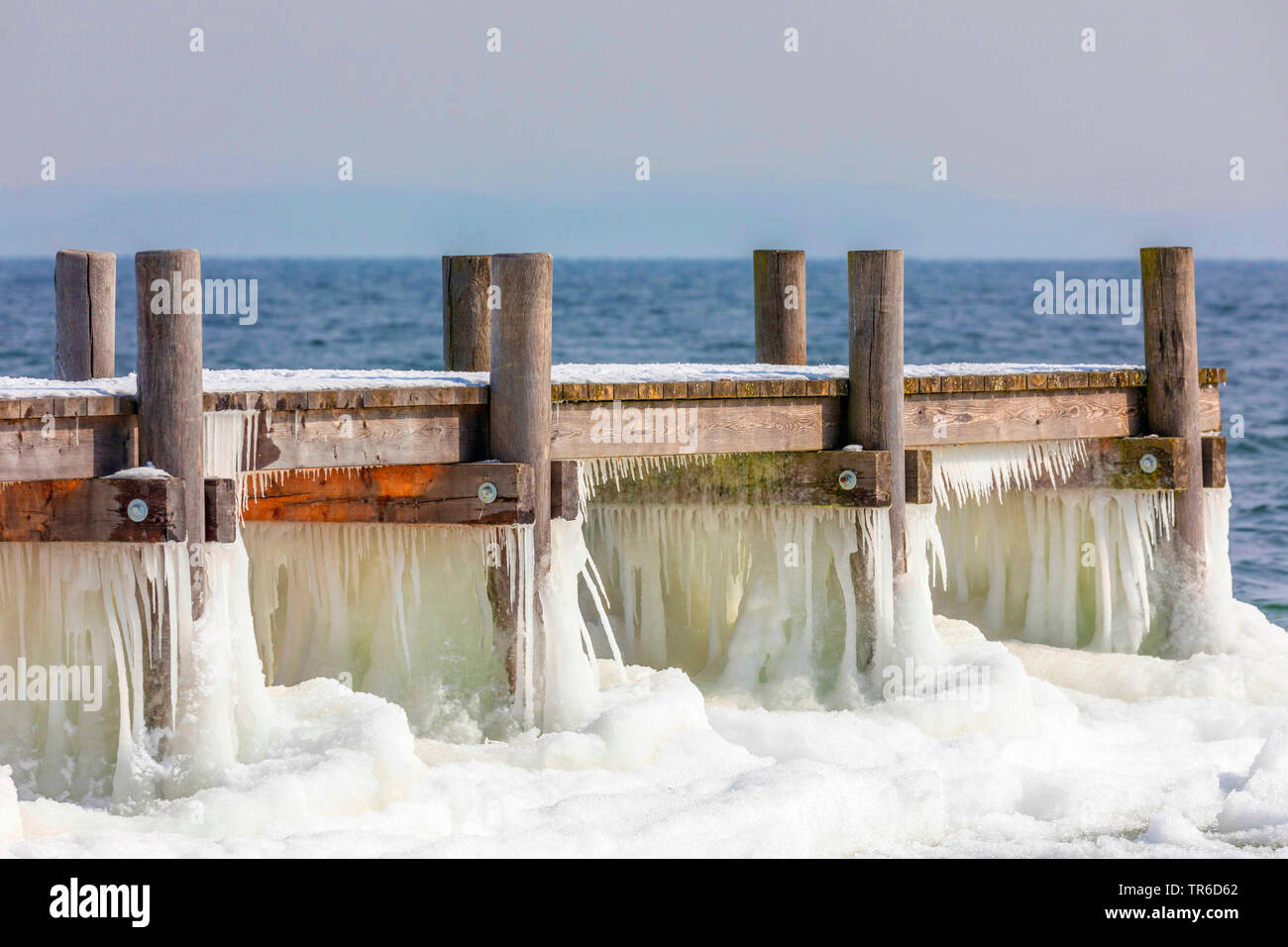 weirdly shaped icing on a landing bridge after winter storm, Germany ...