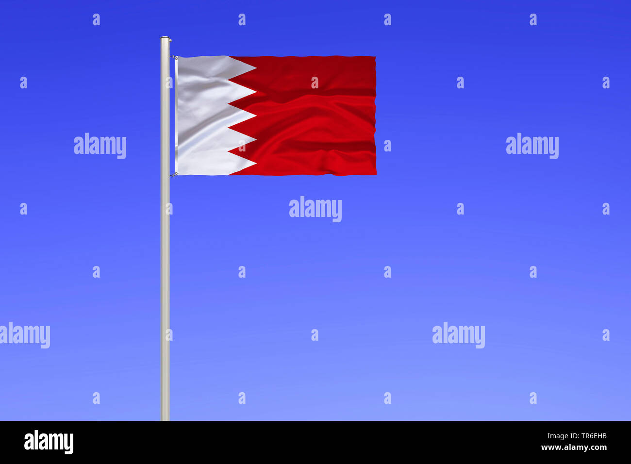 flag of Bahrain against blue sky, Bahrain Stock Photo - Alamy