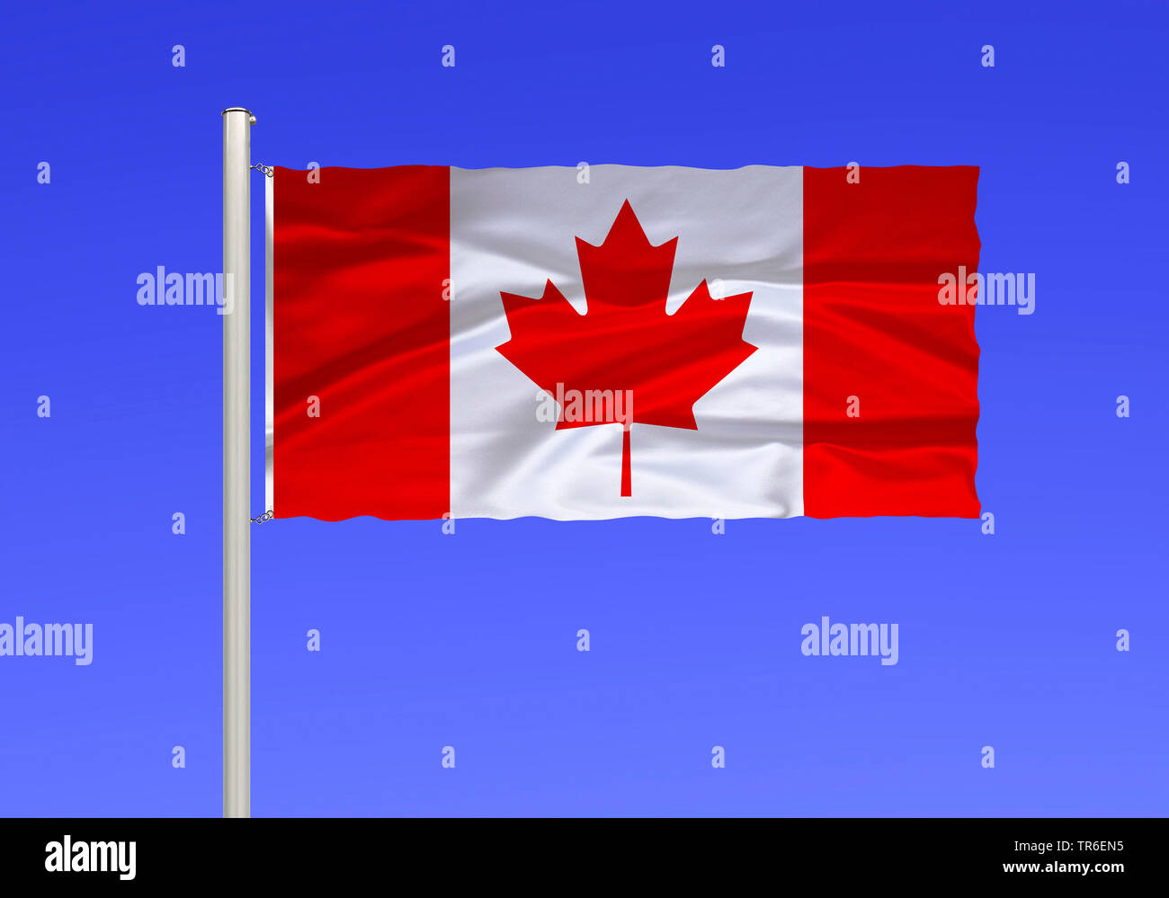flag of Canada against blue sky, Canada Stock Photo - Alamy