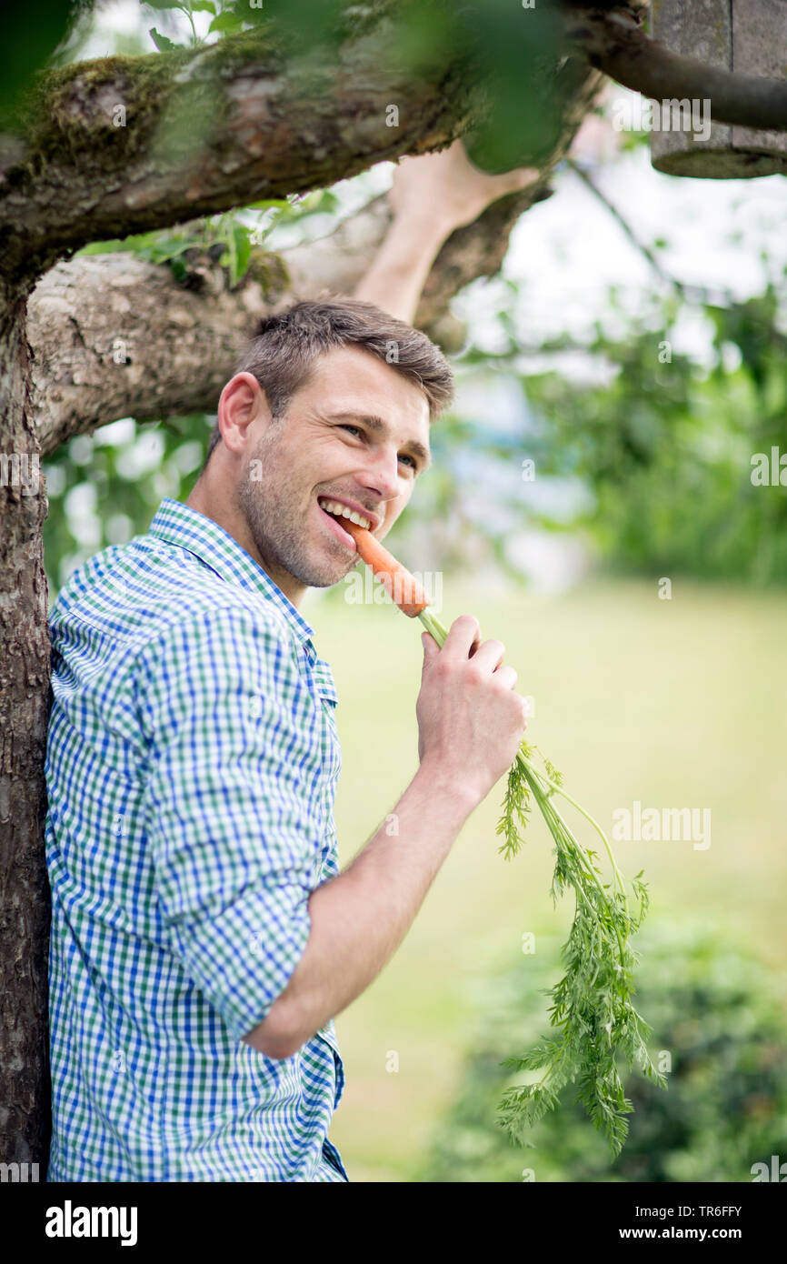 Tree bites man hi-res stock photography and images - Alamy