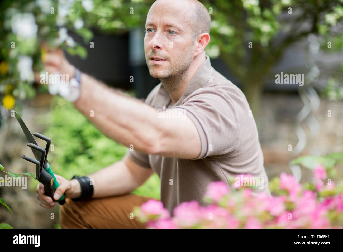 Man gardening hi-res stock photography and images - Alamy