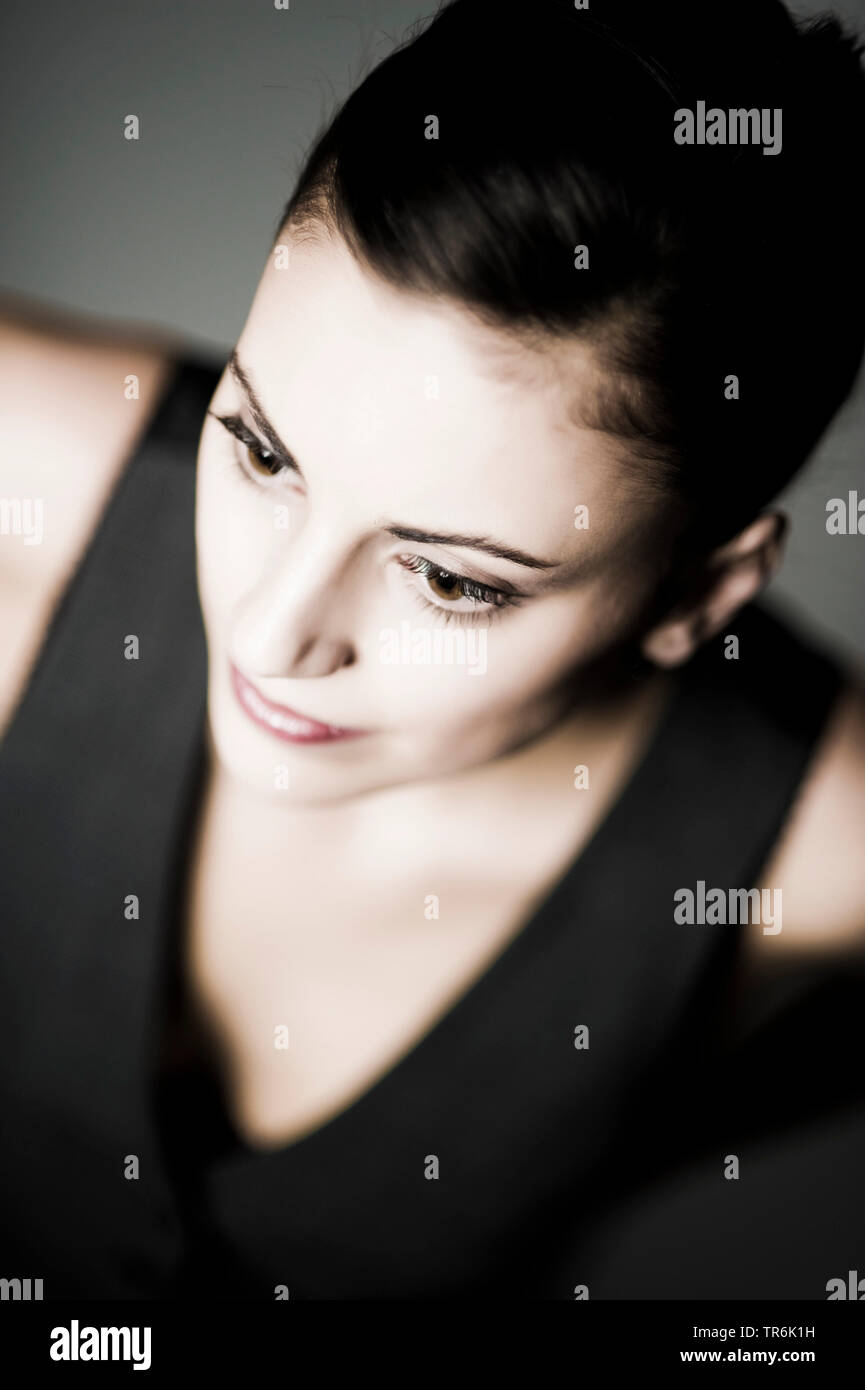 attractive, dark haired woman in portrait Stock Photo - Alamy