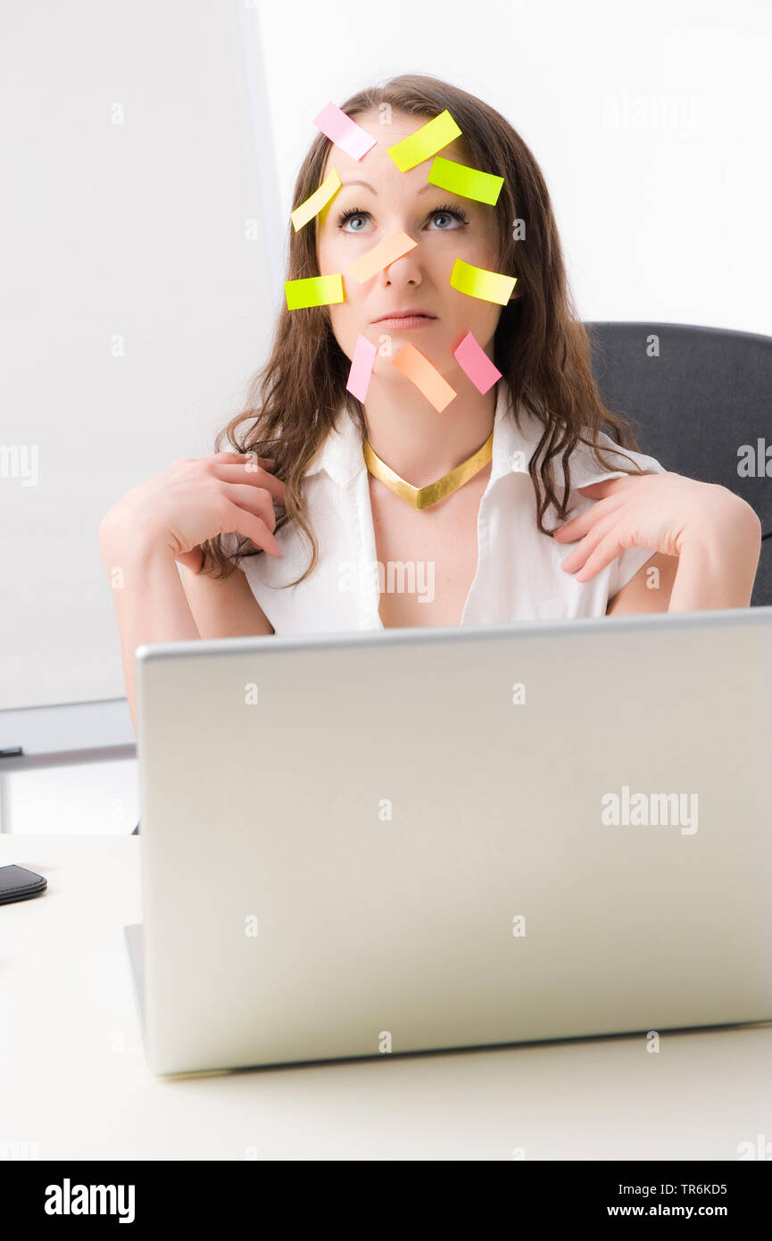 clerk with many post-its on face Stock Photo - Alamy