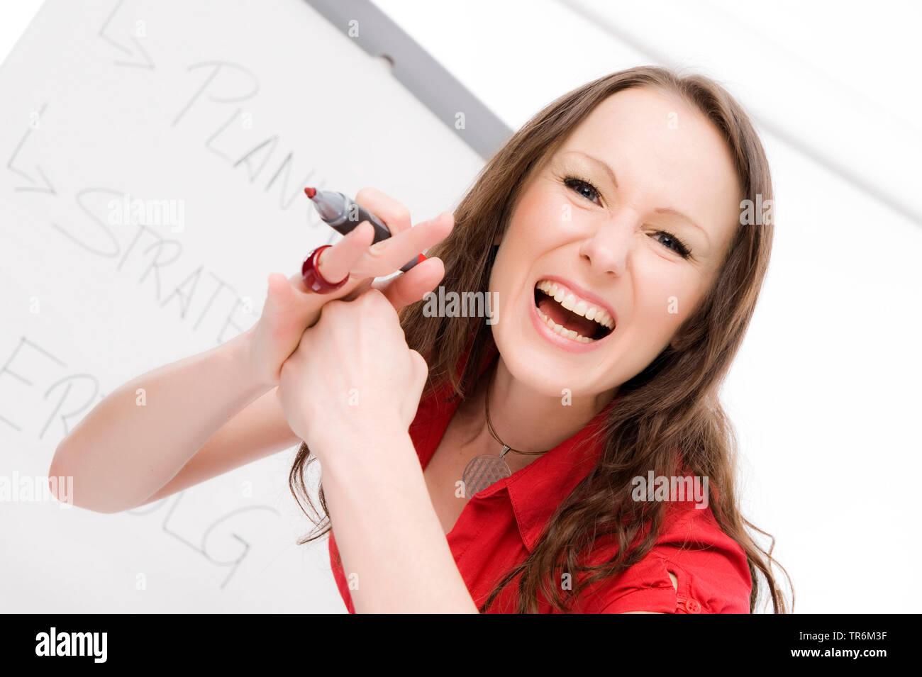 business woman with flip chart Stock Photo - Alamy