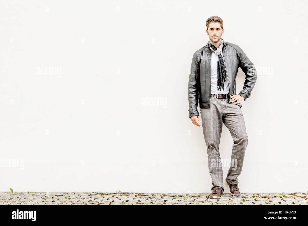 young attractive man with leather jacket in the city, Germany Stock ...
