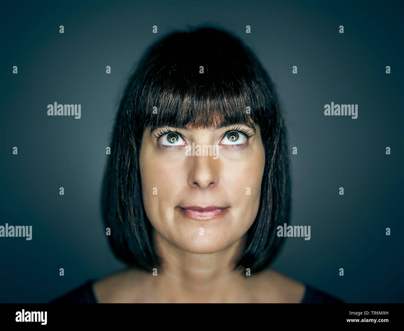 Female long dark hair fringe eyes hi-res stock photography and images ...