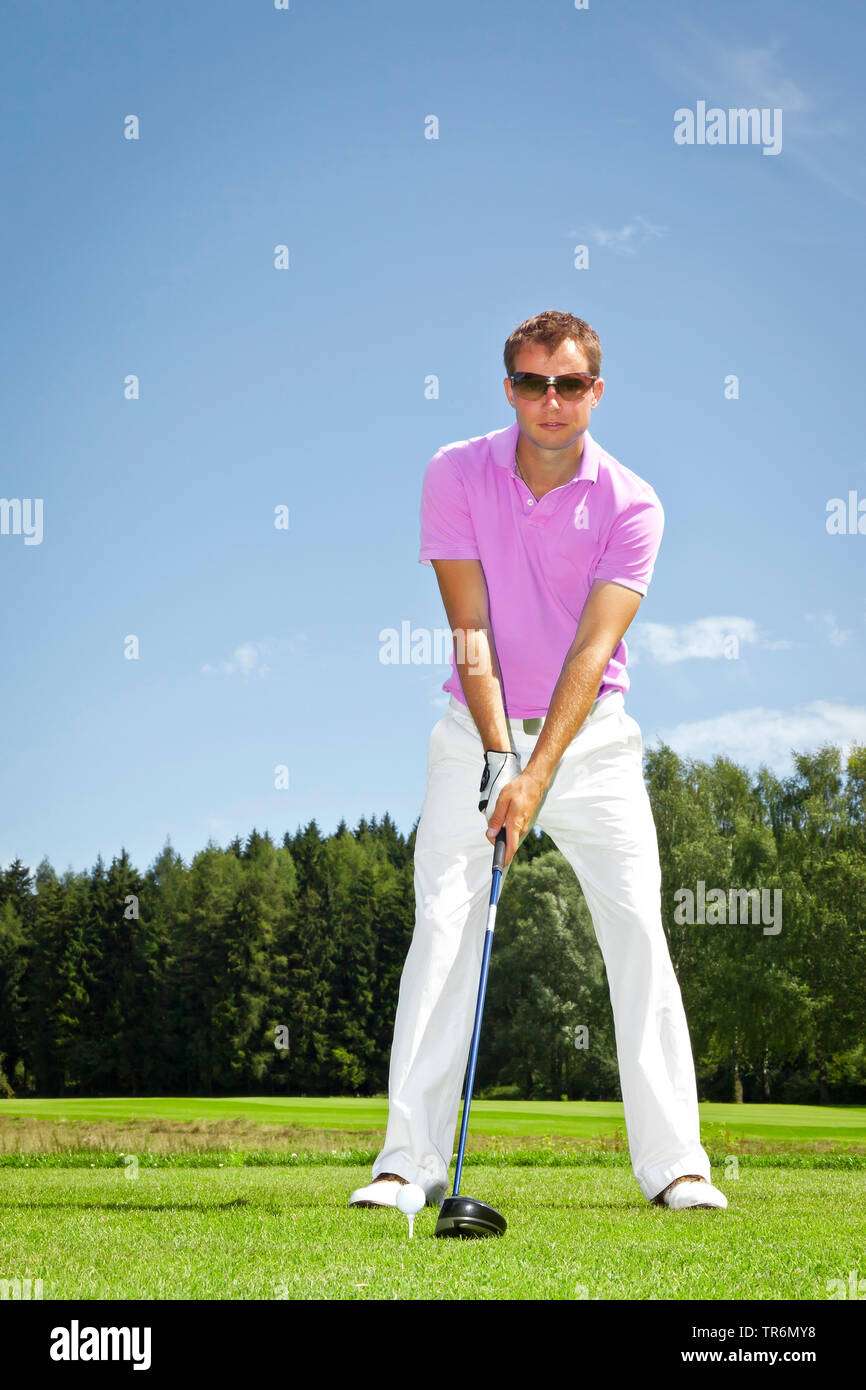 Guys playing golf hi-res stock photography and images - Alamy