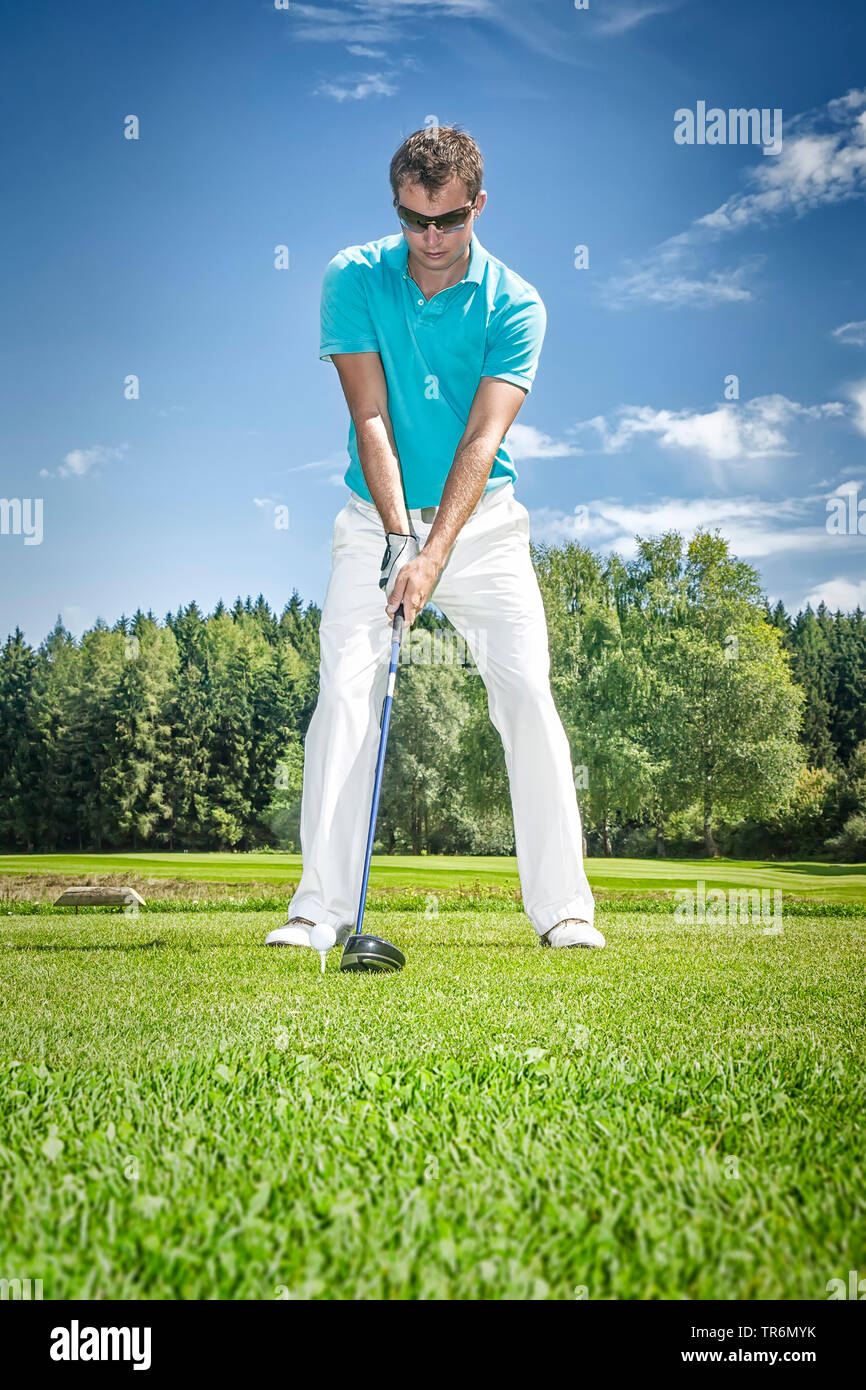 young man playing golf, Germany Stock Photo - Alamy