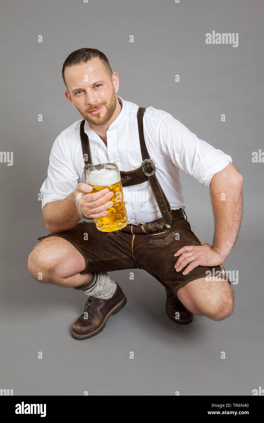 traditional bavarian man drinking mass beer, Germany, Bavaria Stock ...