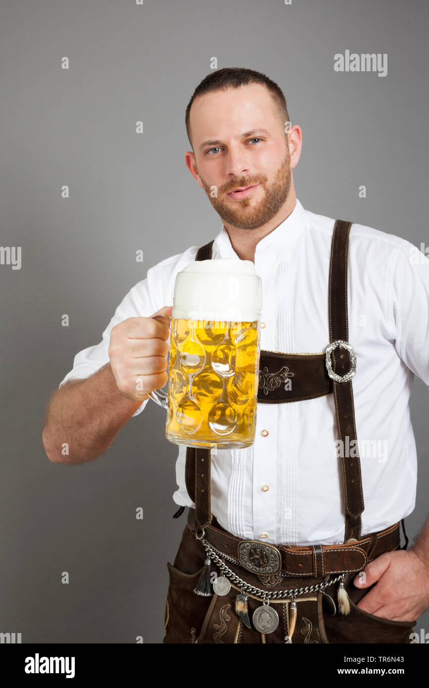 traditional bavarian man drinking mass beer, Germany, Bavaria Stock ...